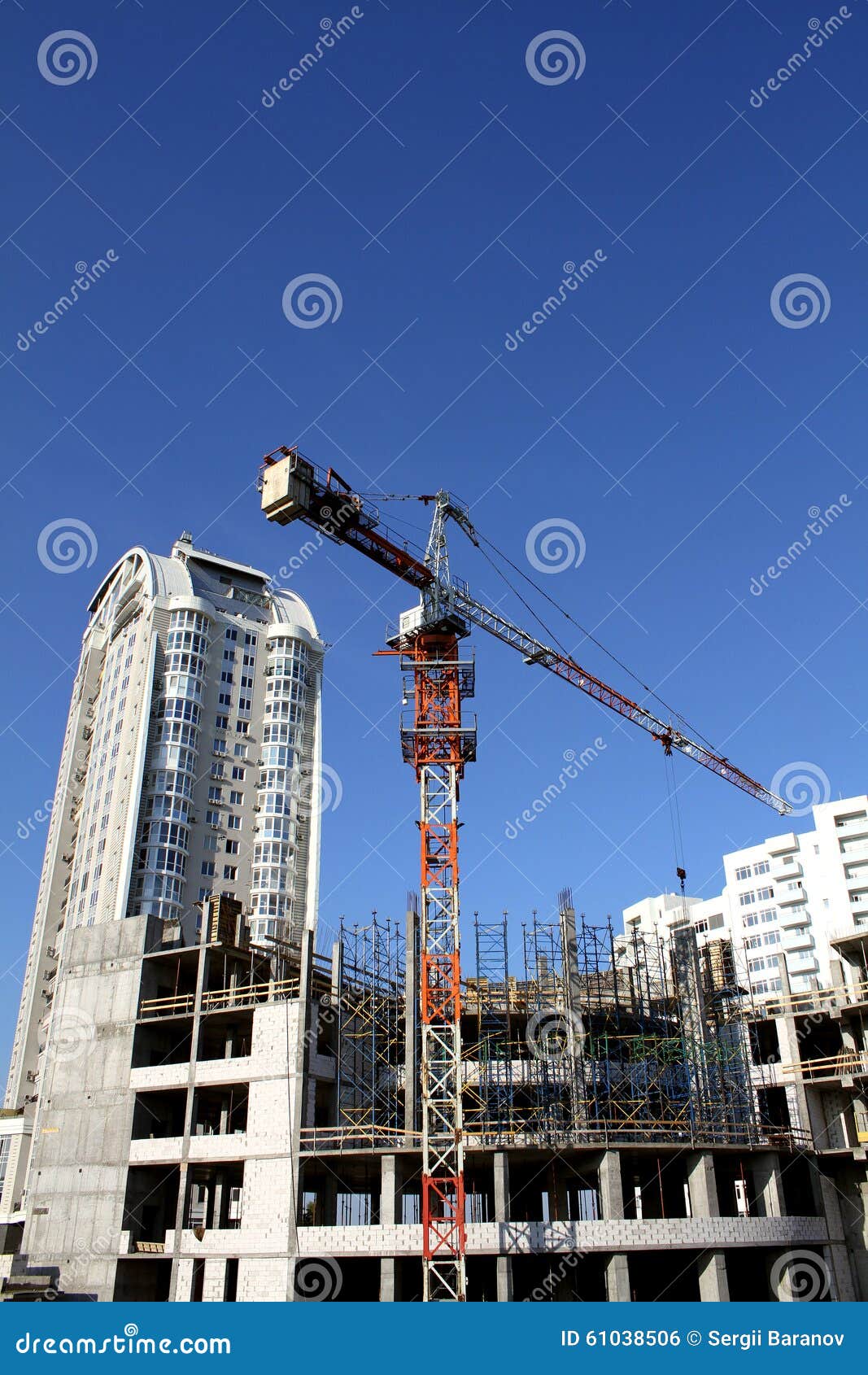 Tower Crane Over Concrete Frame of Building Construction Stock Photo ...