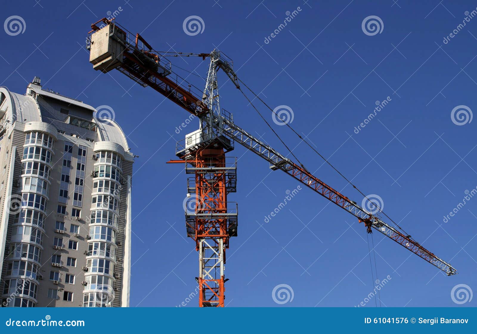 Tower Crane Over Concrete Frame of Building Construction Stock Photo ...