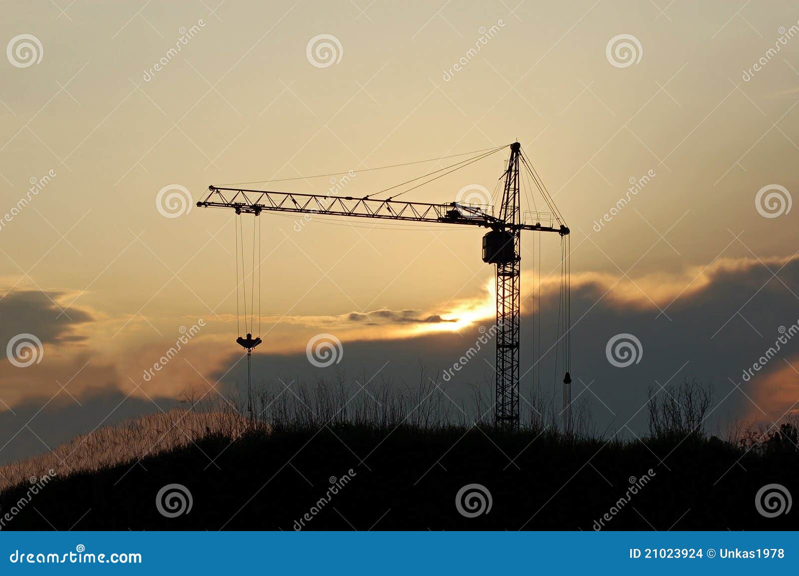Tower crane at sunset stock photo. Image of girder, built - 21023924