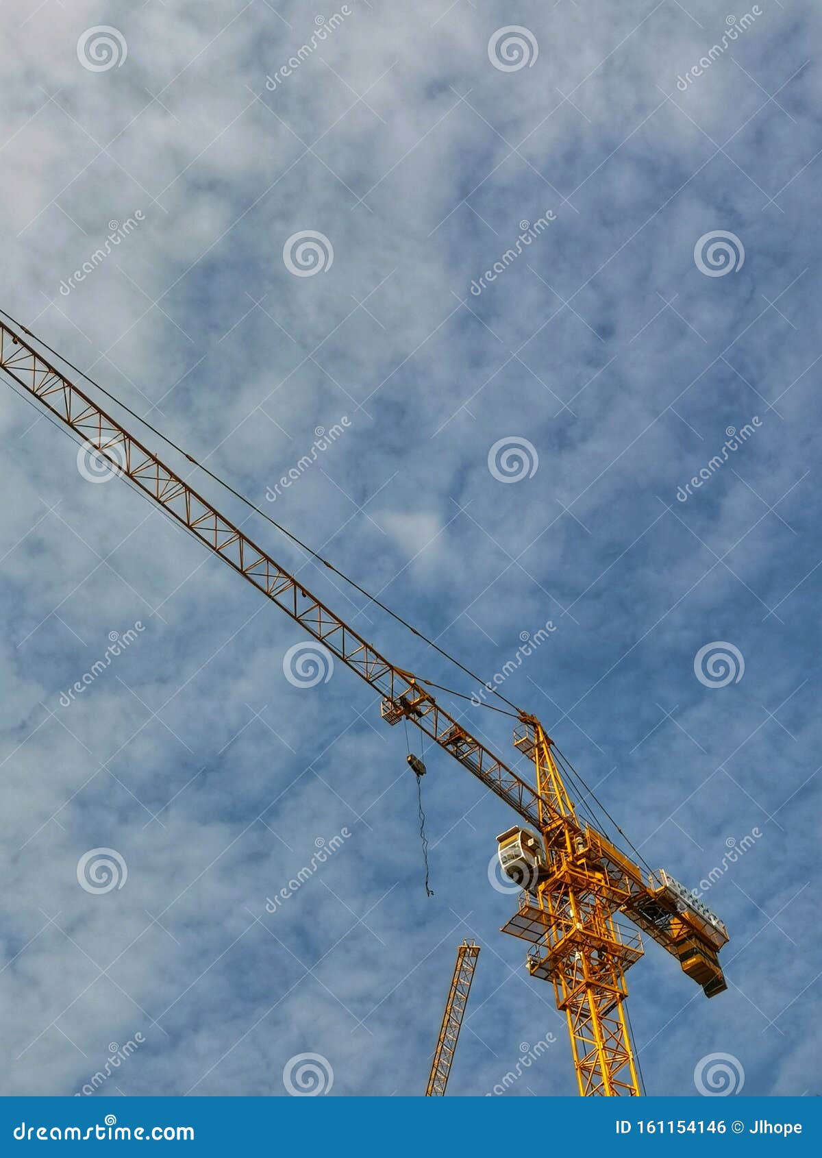 Tower Crane Under Blue Sky and White Clouds Stock Photo - Image of blue ...