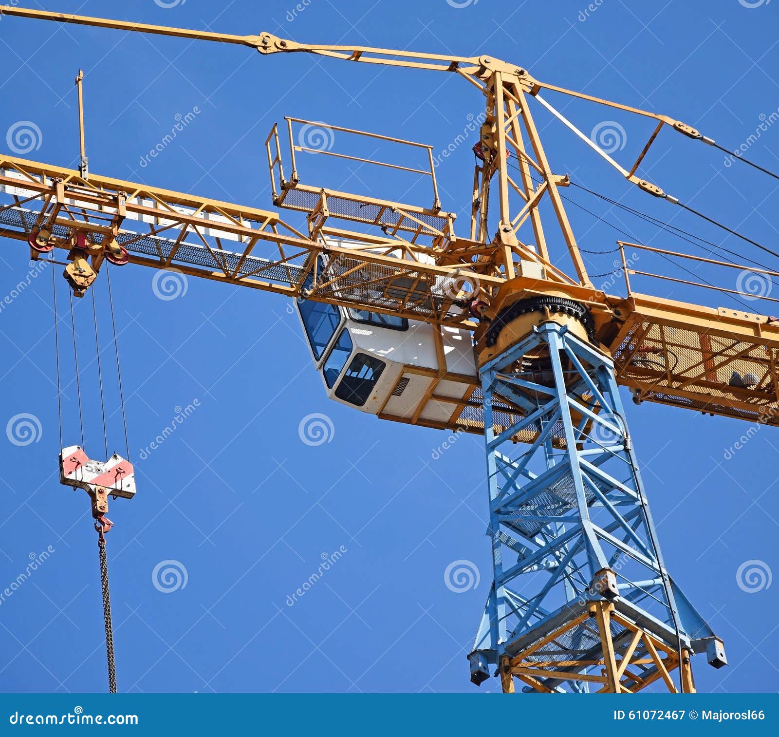 Tower crane at work stock image. Image of activity, brick - 61072467