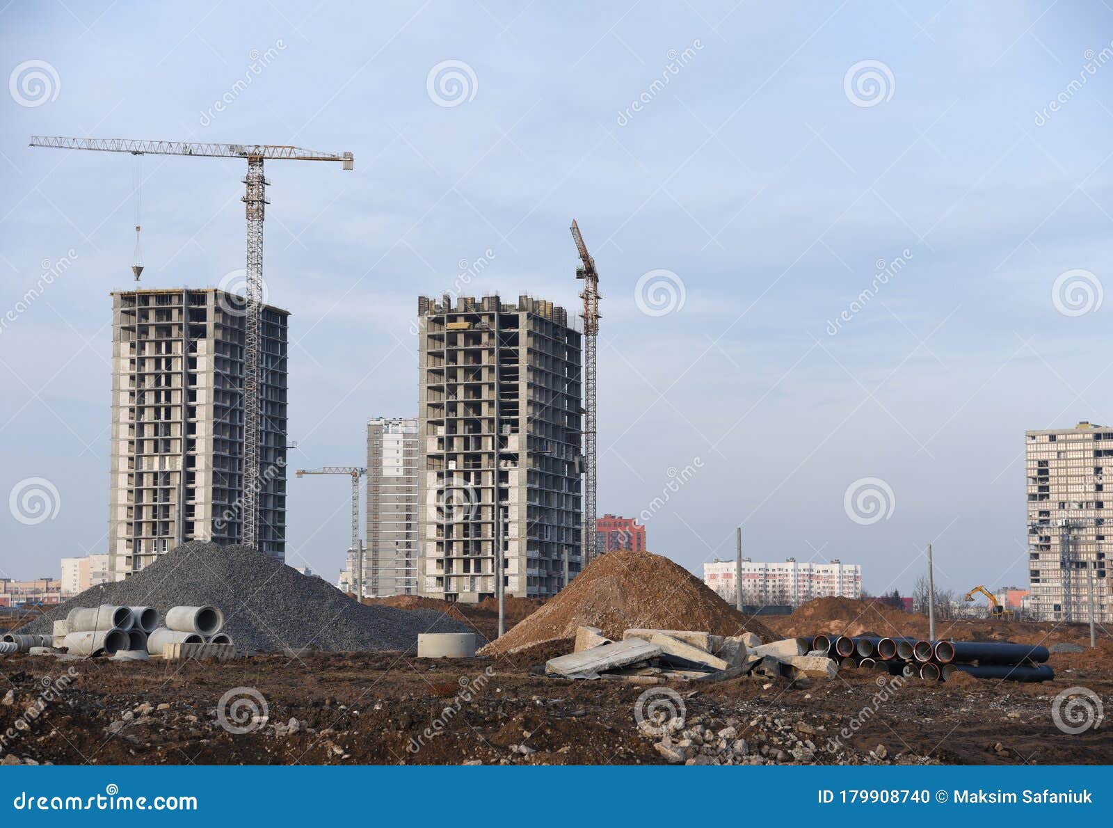Tower Cranes Constructing a New Residential Build. Pouring Concrete ...
