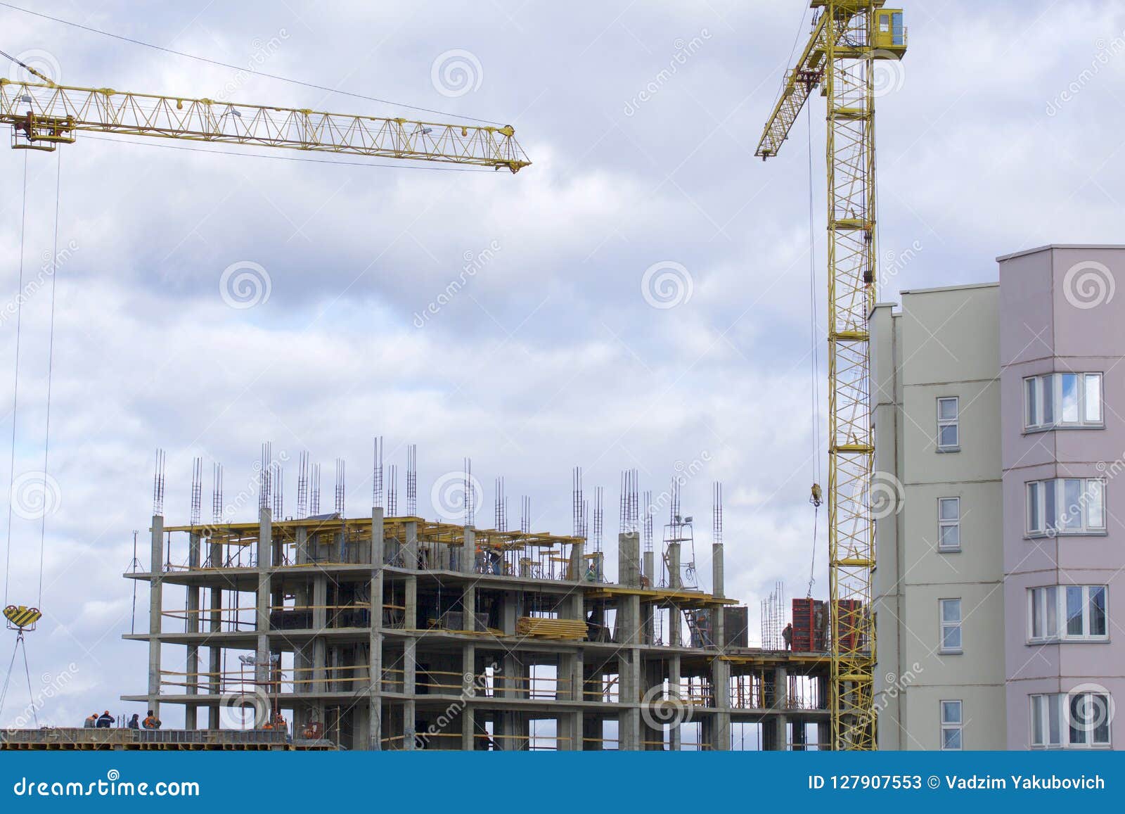 Tower Cranes on the Construction of a Building with a Frame of ...