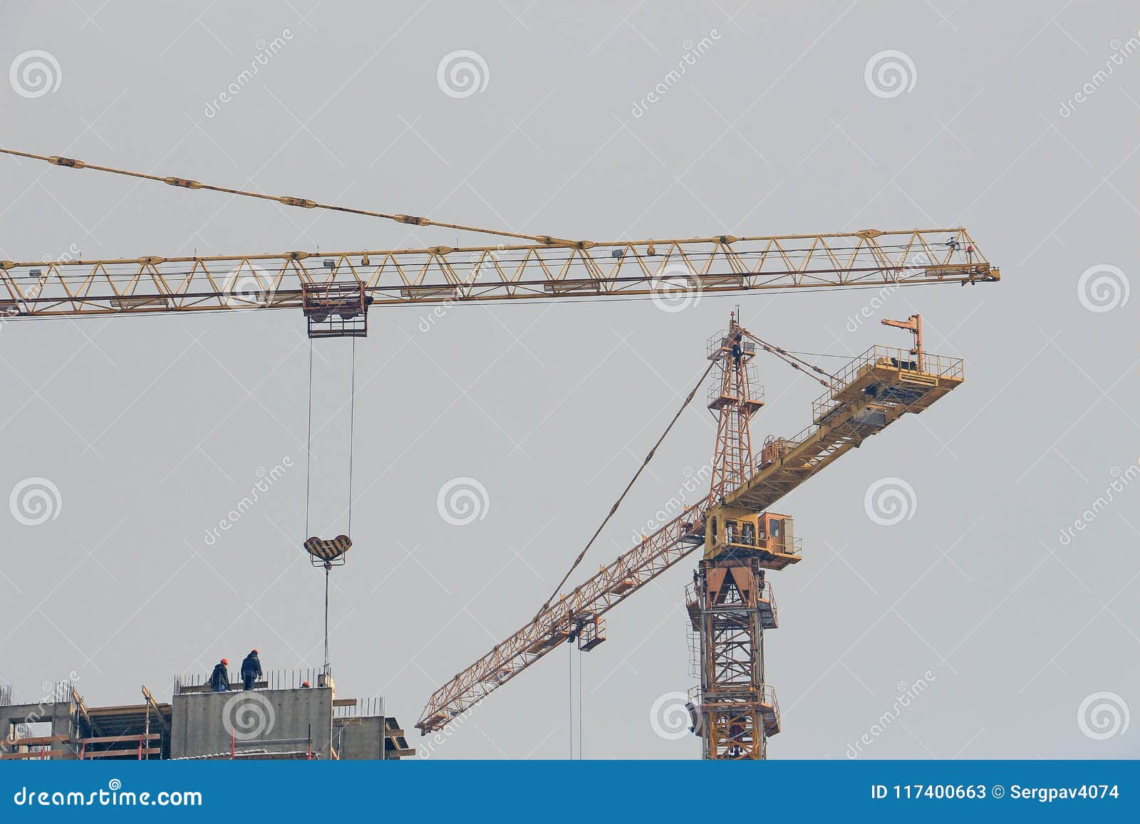 Two Tower Cranes on the Construction of a High-rise Building Stock ...