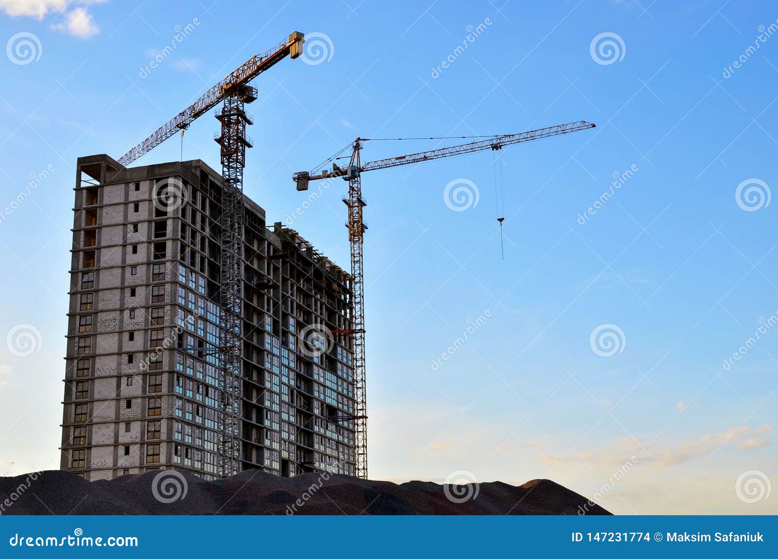 Tower Cranes at Construction Site, Construction of High-rise Building ...