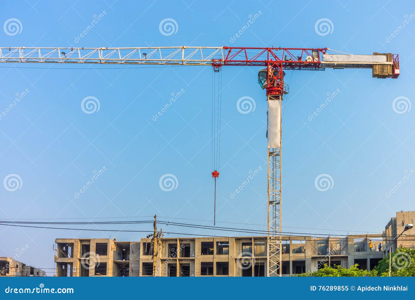 Tower cranes over building stock image. Image of counterweights - 76289855