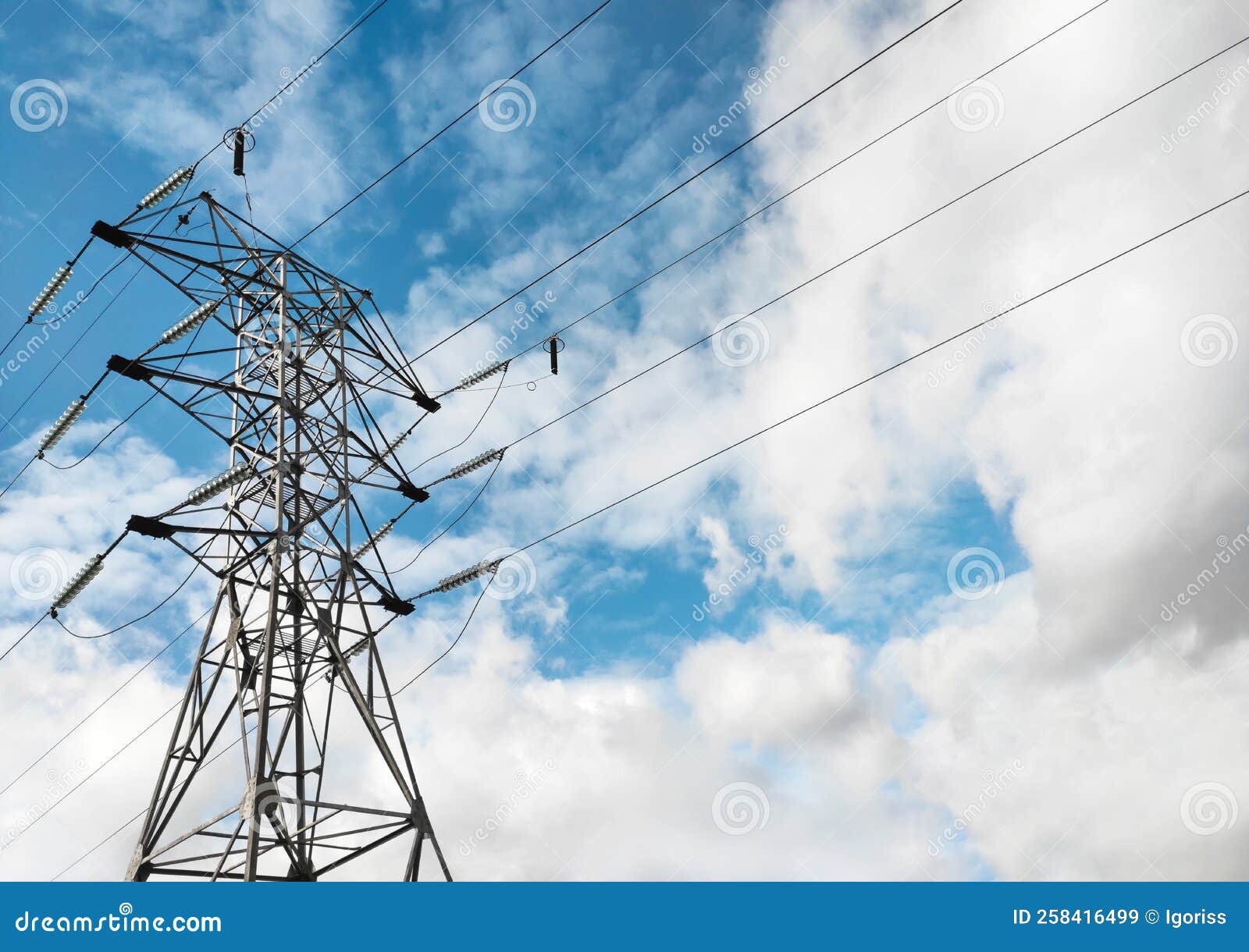 Tower of Electrical Power Lines on Blue Cloudy Sky Background Stock ...