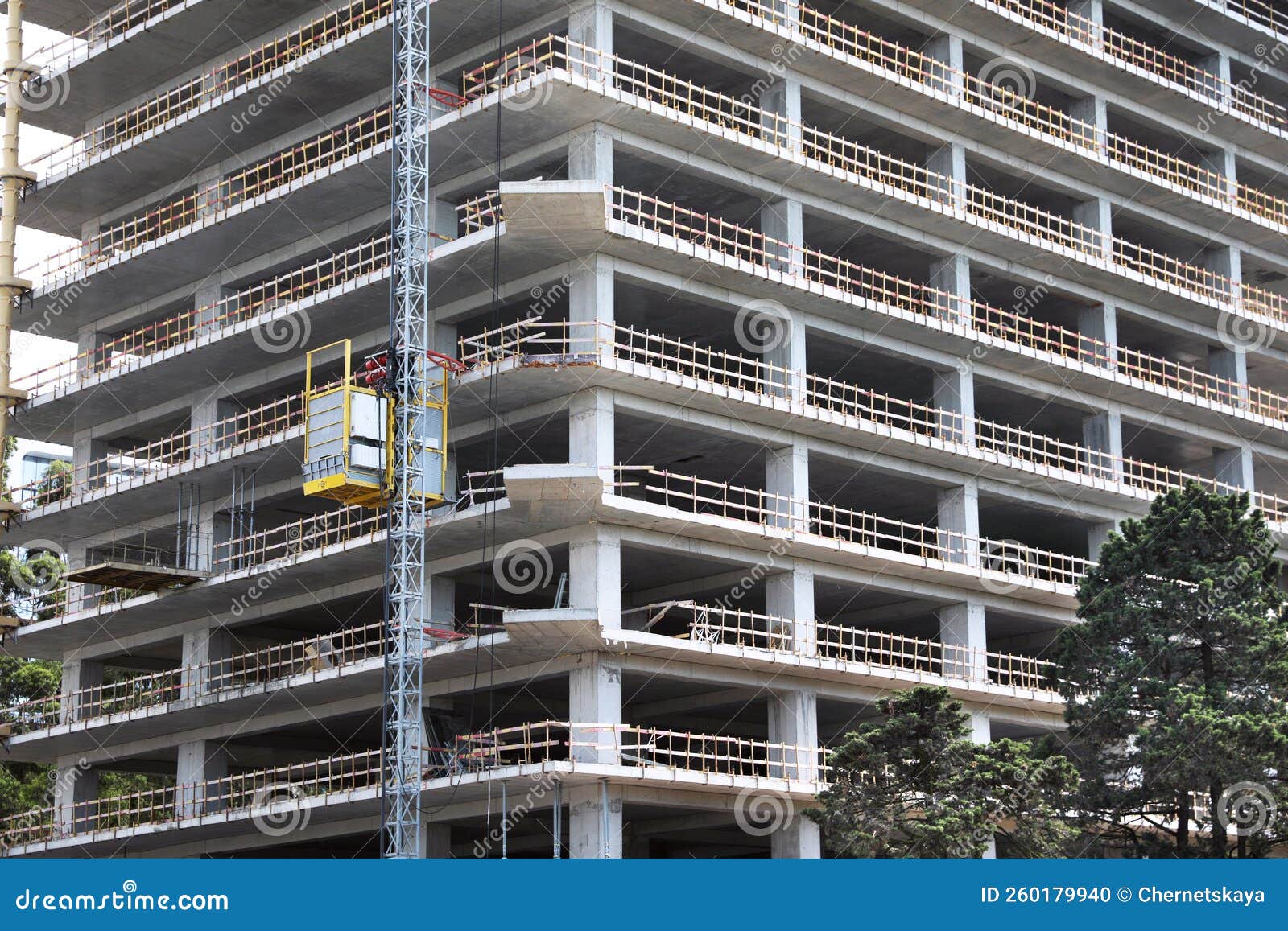 Tower with Elevator Near Multistory Building Under Construction Stock ...