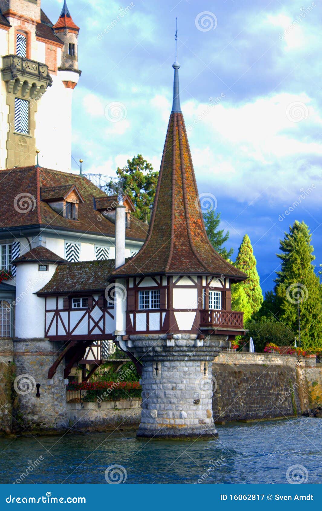 Tower Extending into Lake from Building Stock Image - Image of ...