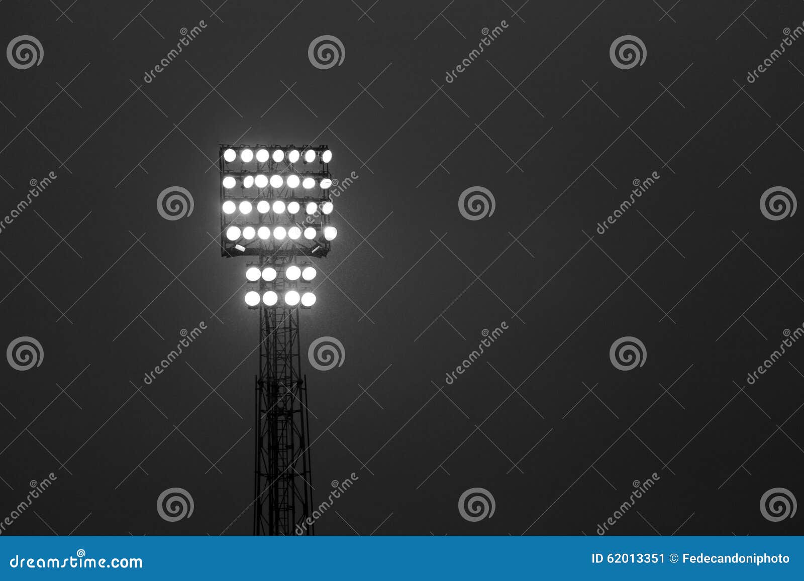 Tower Floodlights with Many Floodlights during the Night Show Stock ...