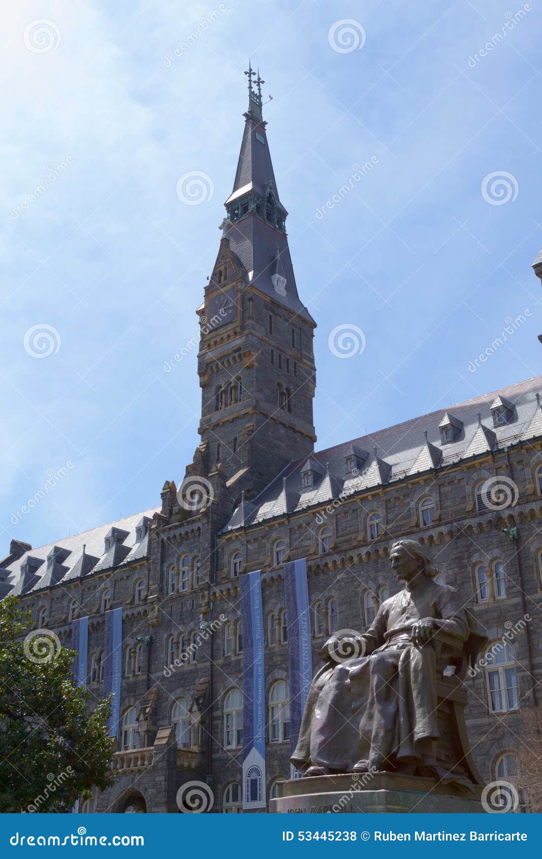 Tower of Georgetown University with the Statue of John Carroll ...
