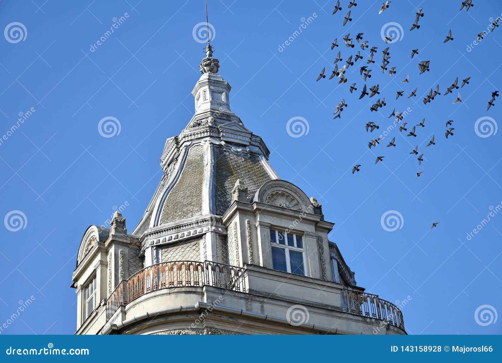 Tower of the Hotel Building with Doves Stock Photo - Image of flying ...