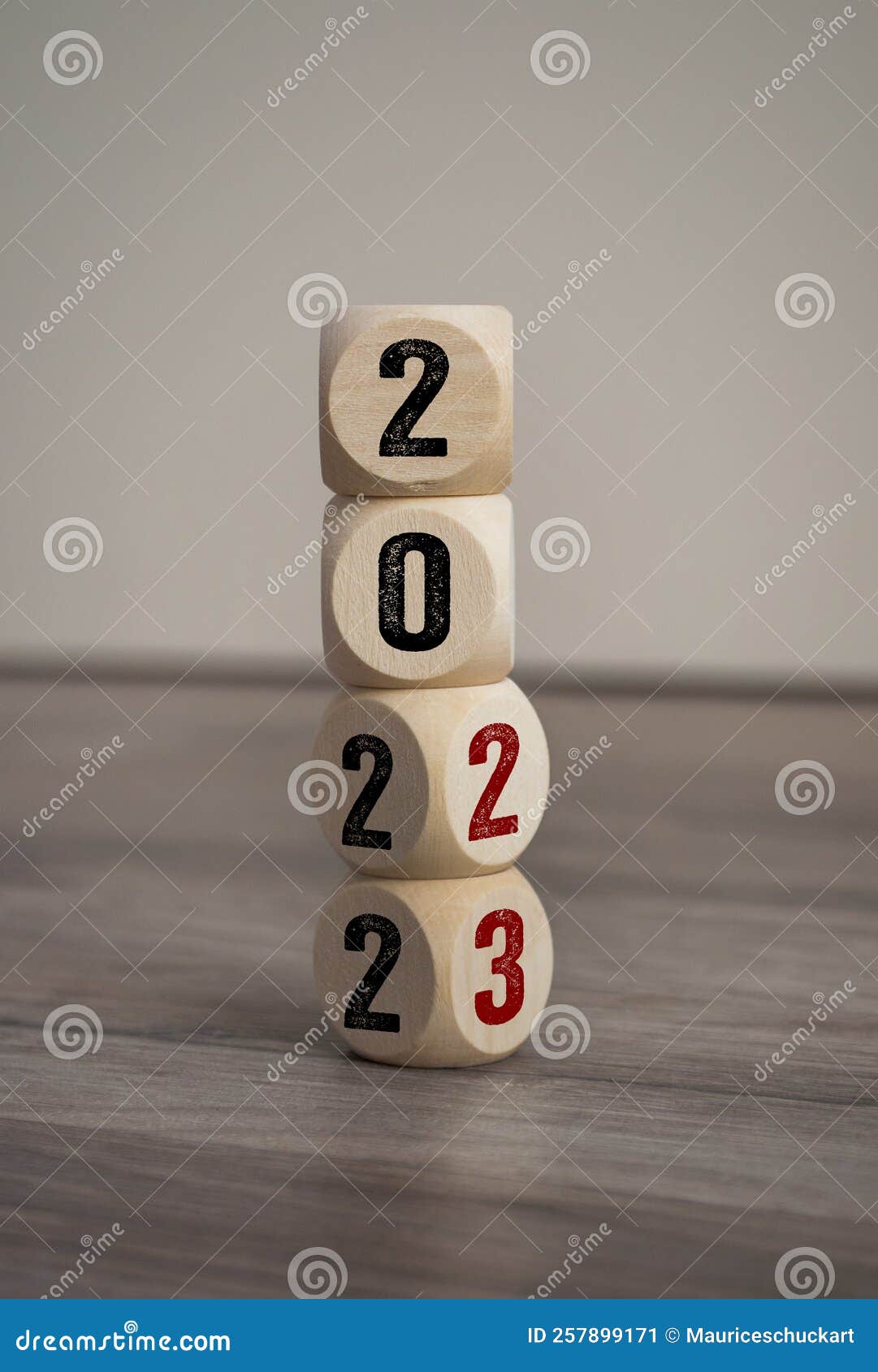 Tower Made of Cubes and Dice with 2022 and 2023 on Wooden Background ...