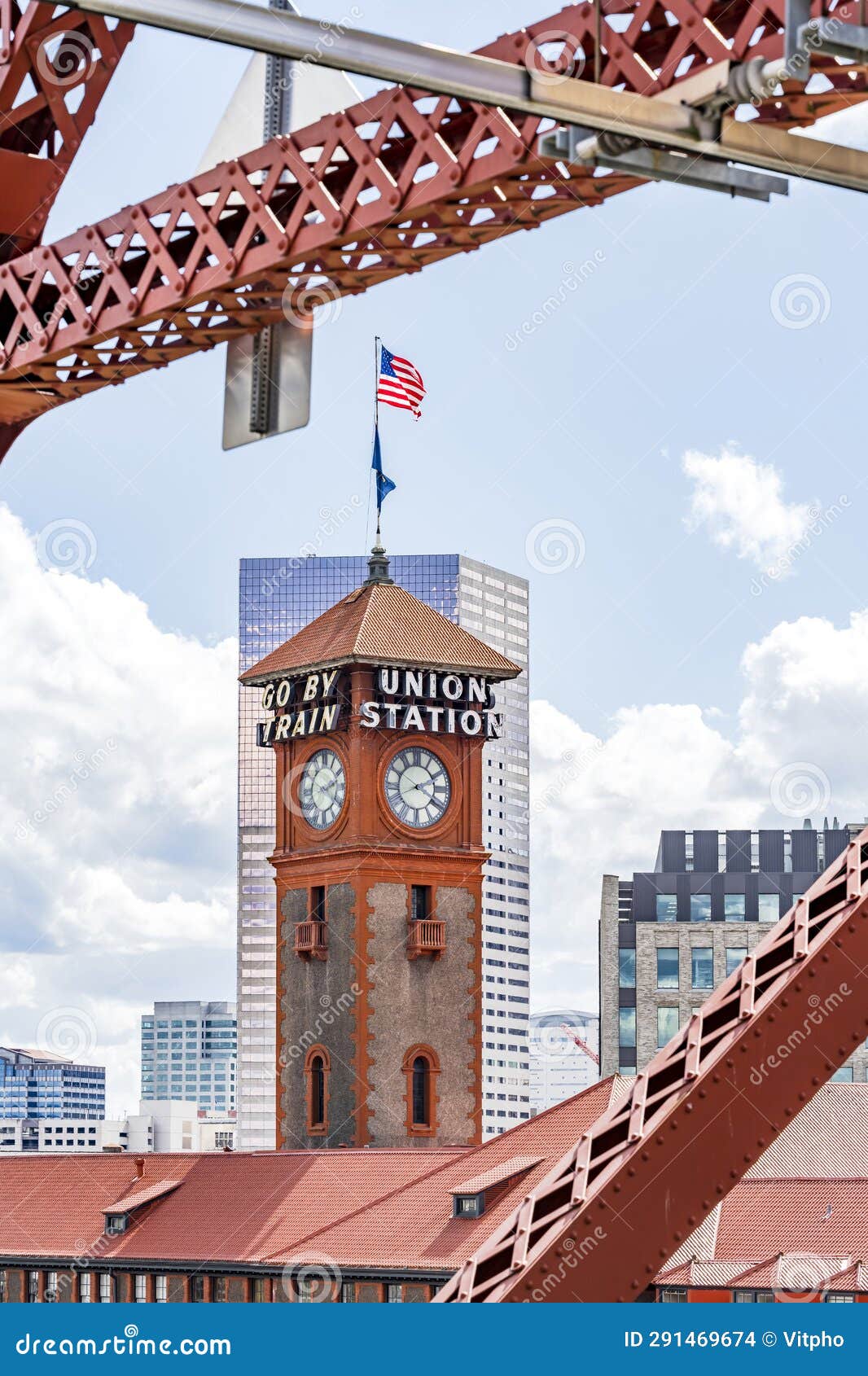 The Tower of the Old Railway Station Against the Backdrop of a Modern ...