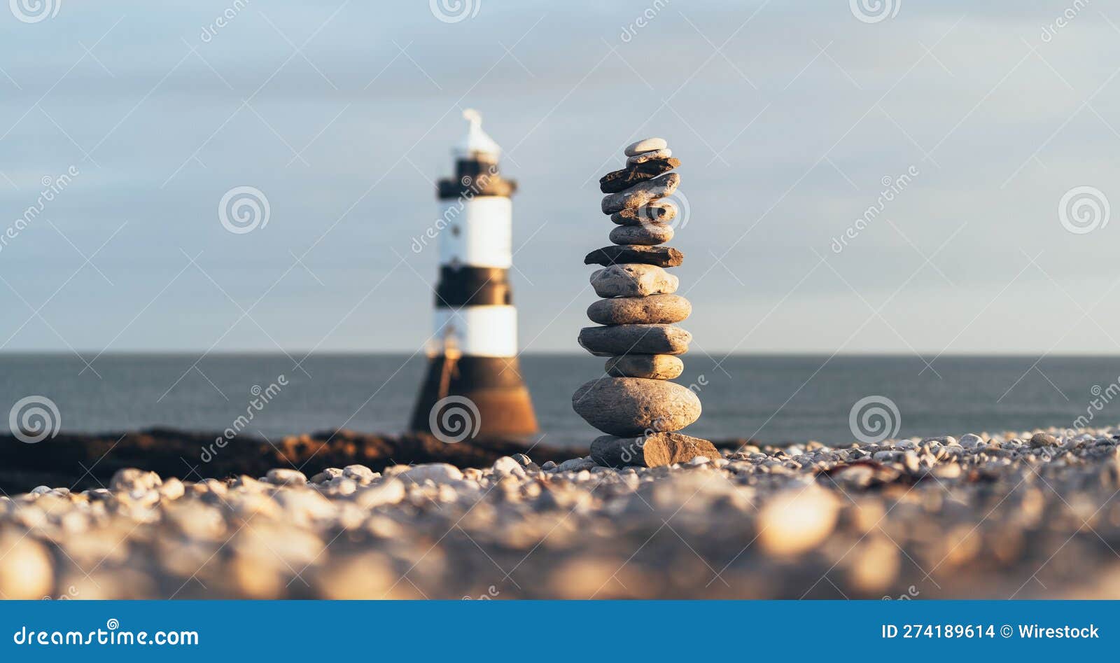 Tower of Rocks at the Shore on the Background of the Penmon Point ...