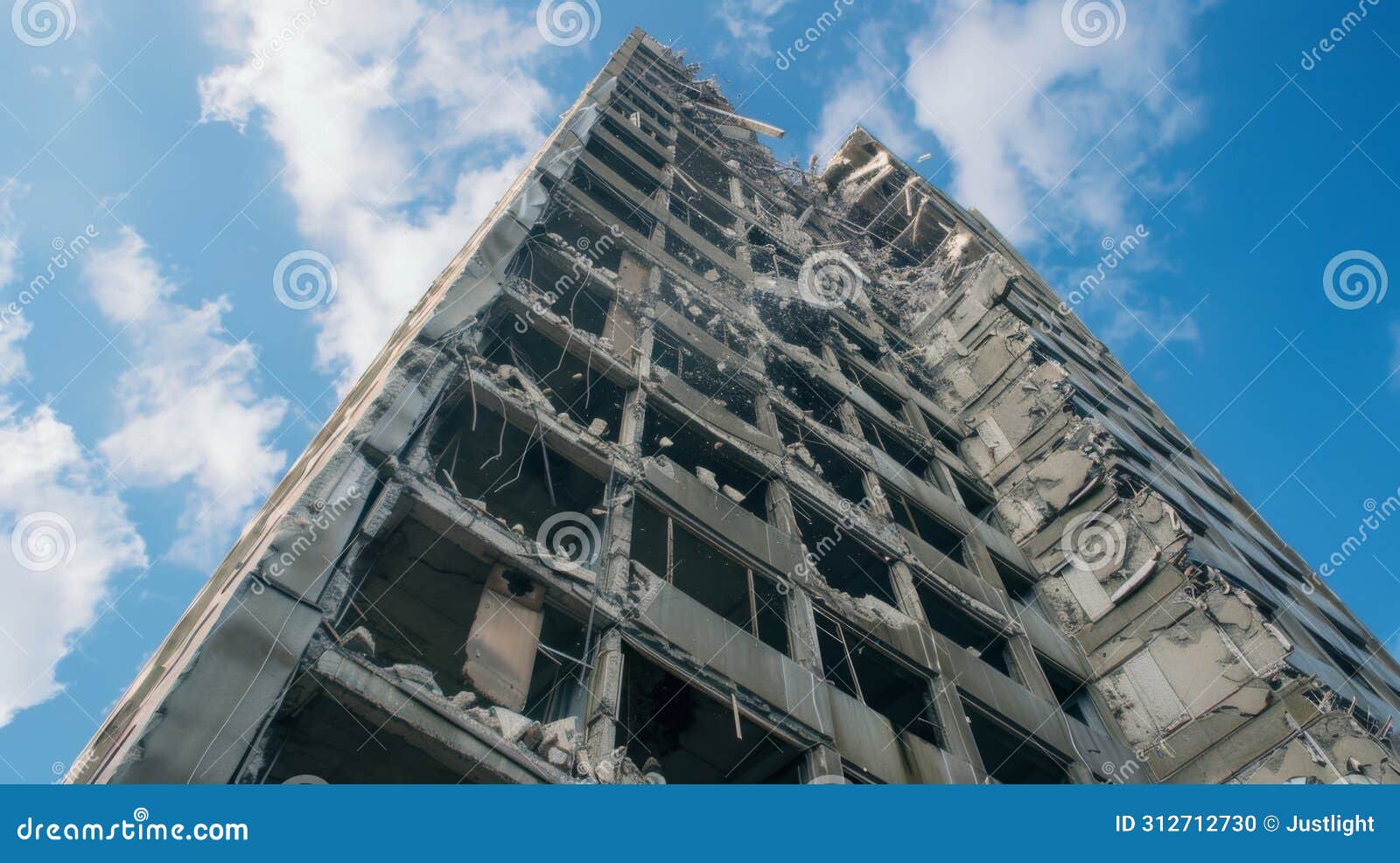 A Towering Building with Shattered Windows and Chunks of Concrete ...