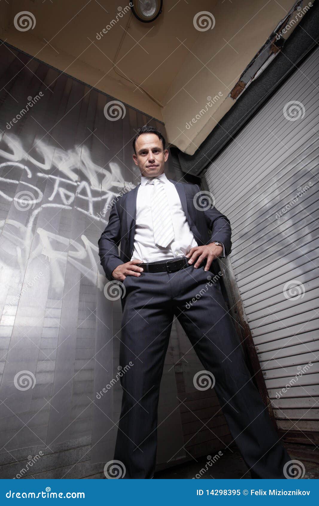 Towering businessman stock image. Image of business, metal - 14298395