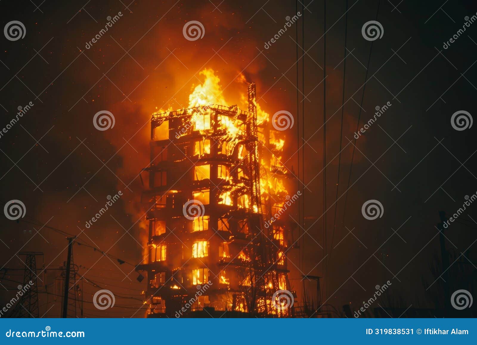A Towering Structure Ablaze with Fire in the Dark of Night, Flames ...