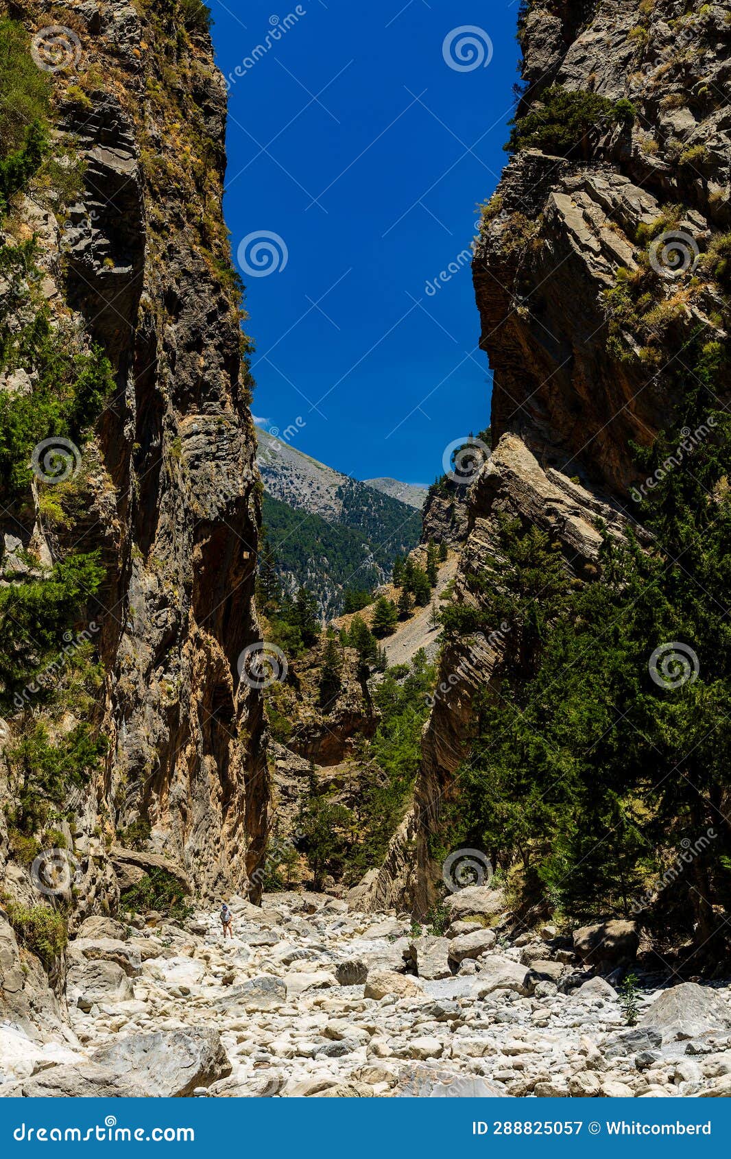Towering Vertical Cliffs and a Rocky, Dry Riverbed in the Samaria Gorge ...