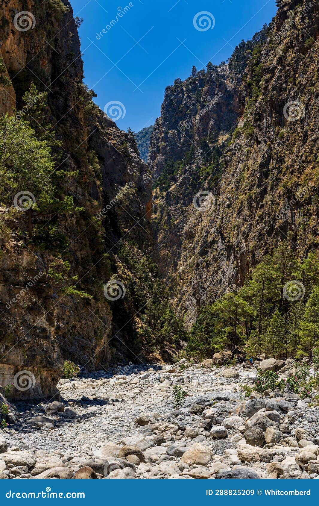 Towering Vertical Cliffs and a Rocky, Dry Riverbed in the Samaria Gorge ...