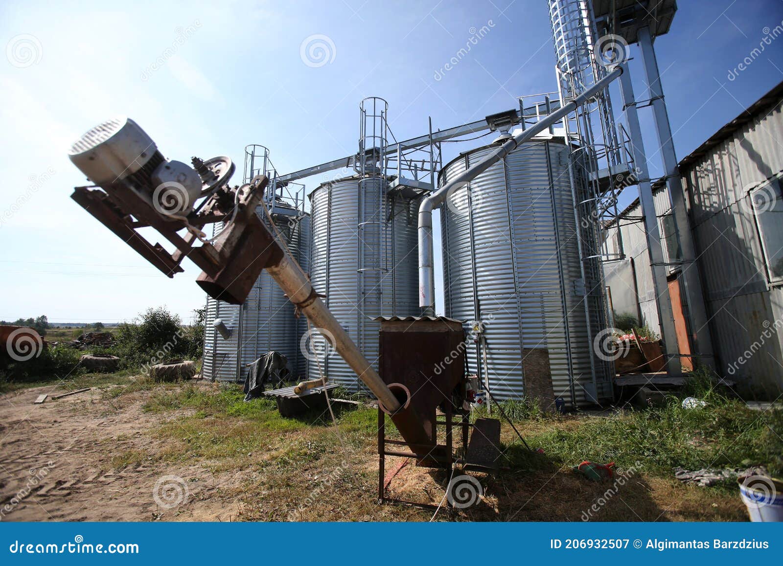 Towers of Grain Drying Enterprise. Metal Grain Facility with Silos ...