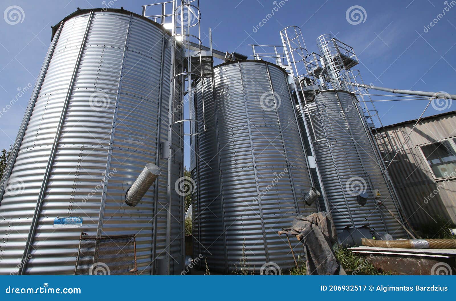 Towers of Grain Drying Enterprise. Metal Grain Facility with Silos ...
