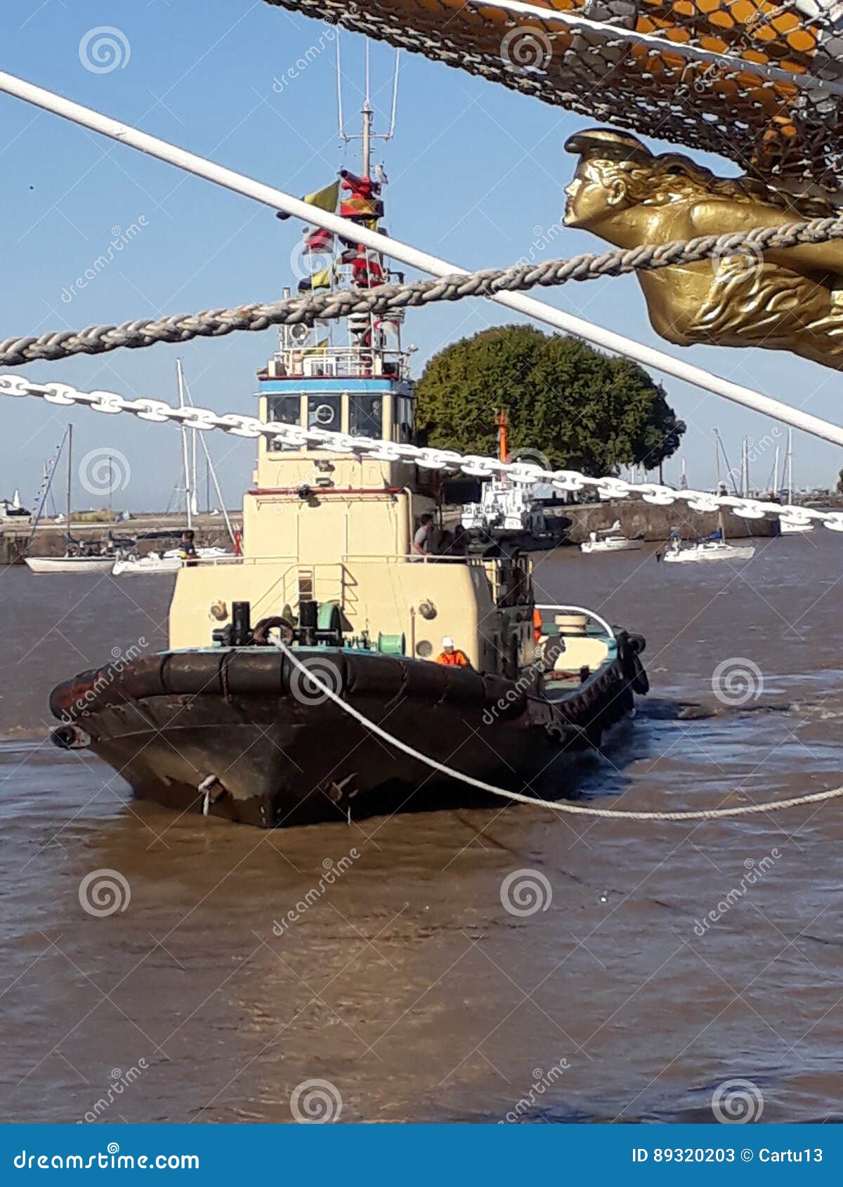Towing Ship In The Open Sea, Blue Tugboat Sailing On Sea Stock Photo ...