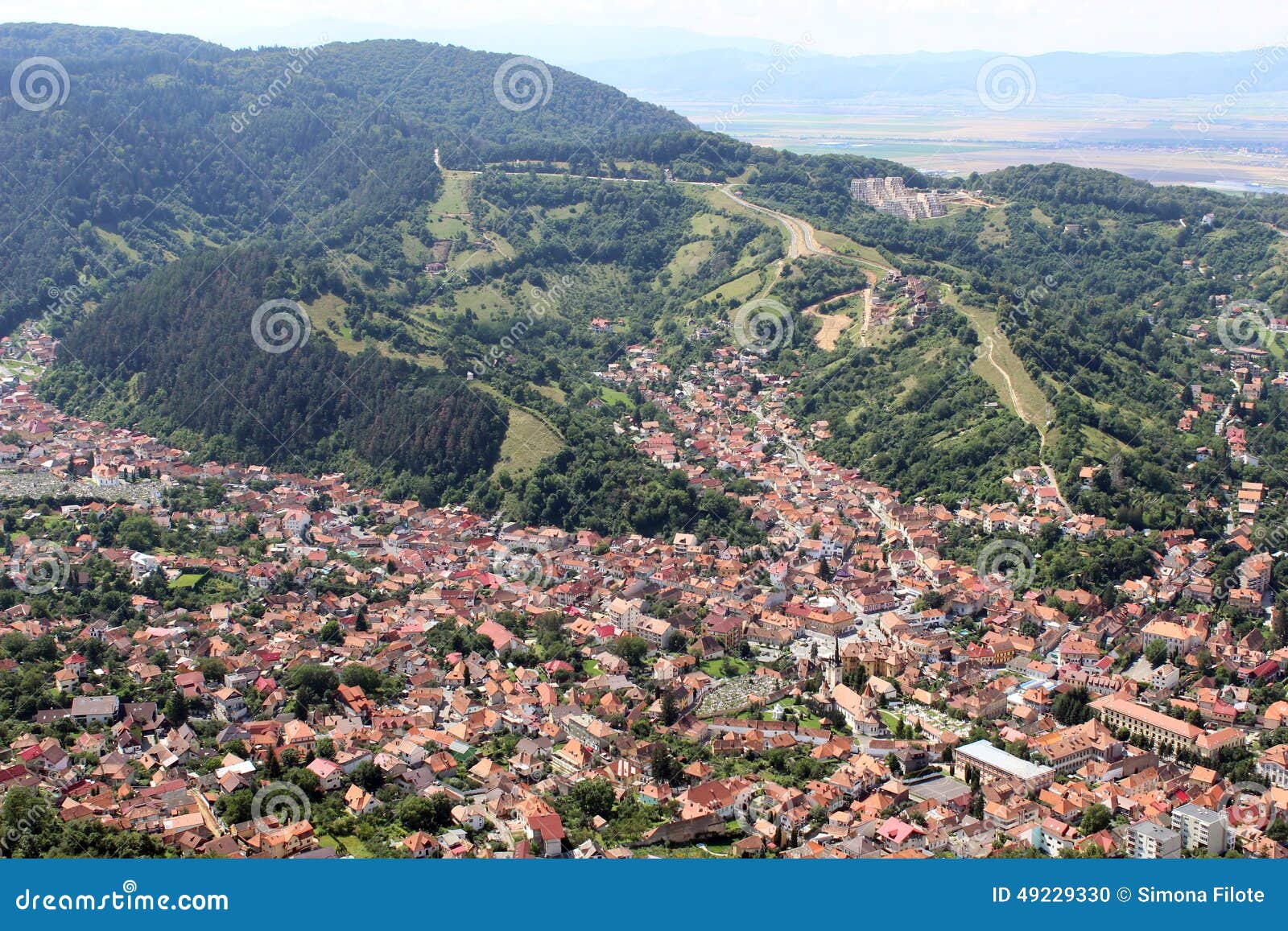 A town between mountains stock photo. Image of roofs - 49229330