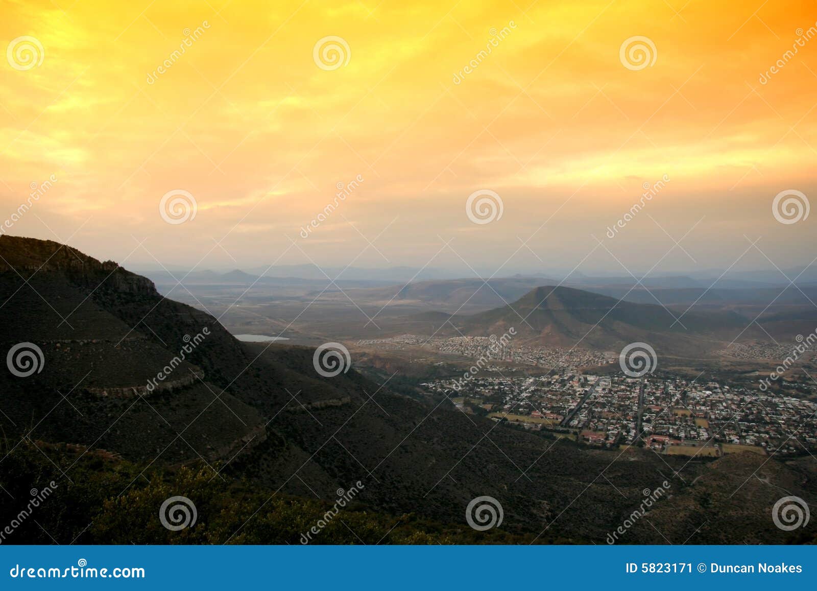 Town at Sunset stock image. Image of distant, mountains - 5823171