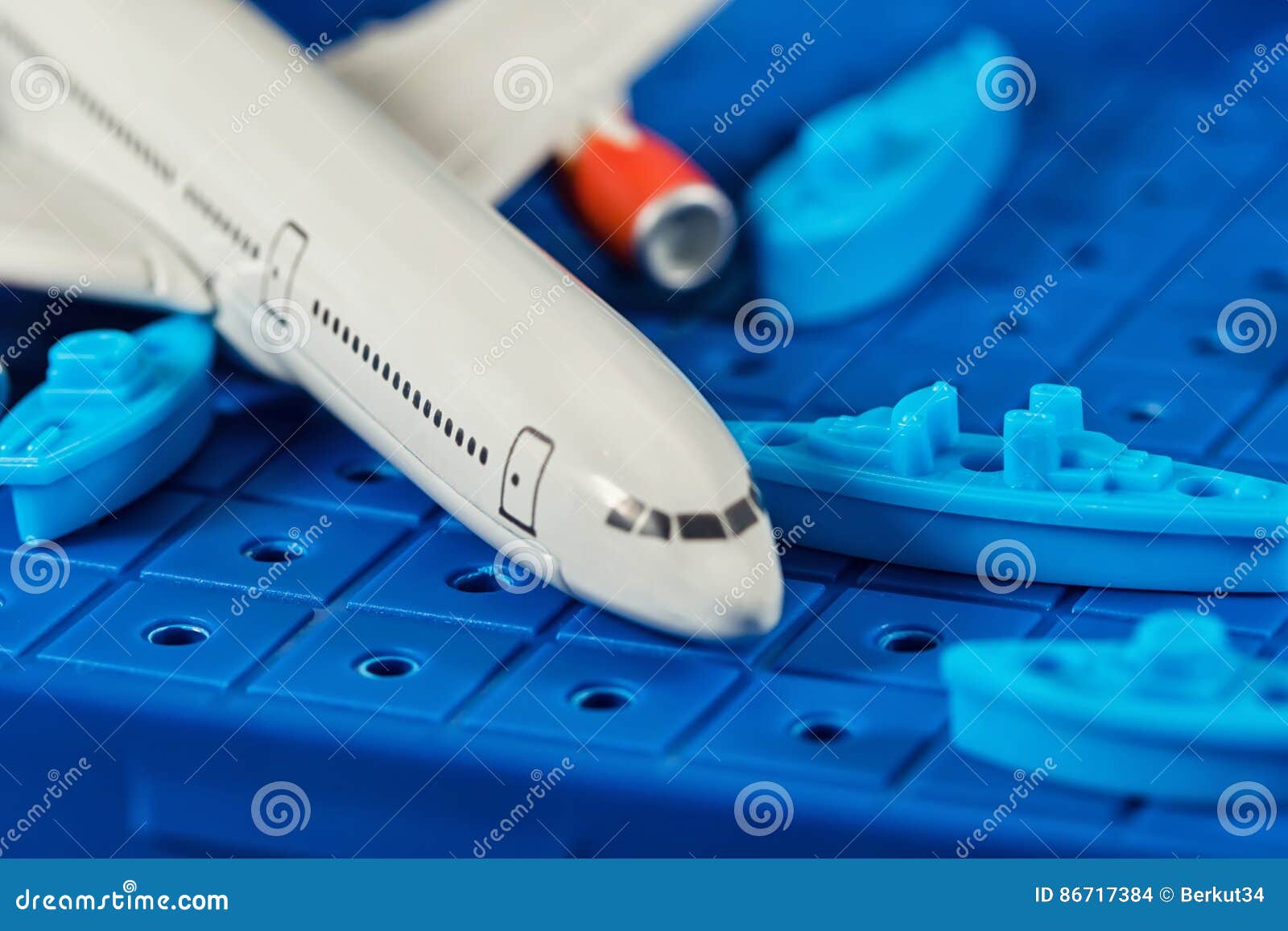 Toy Airliner Crashed among Toy Warships Stock Photo - Image of airliner ...