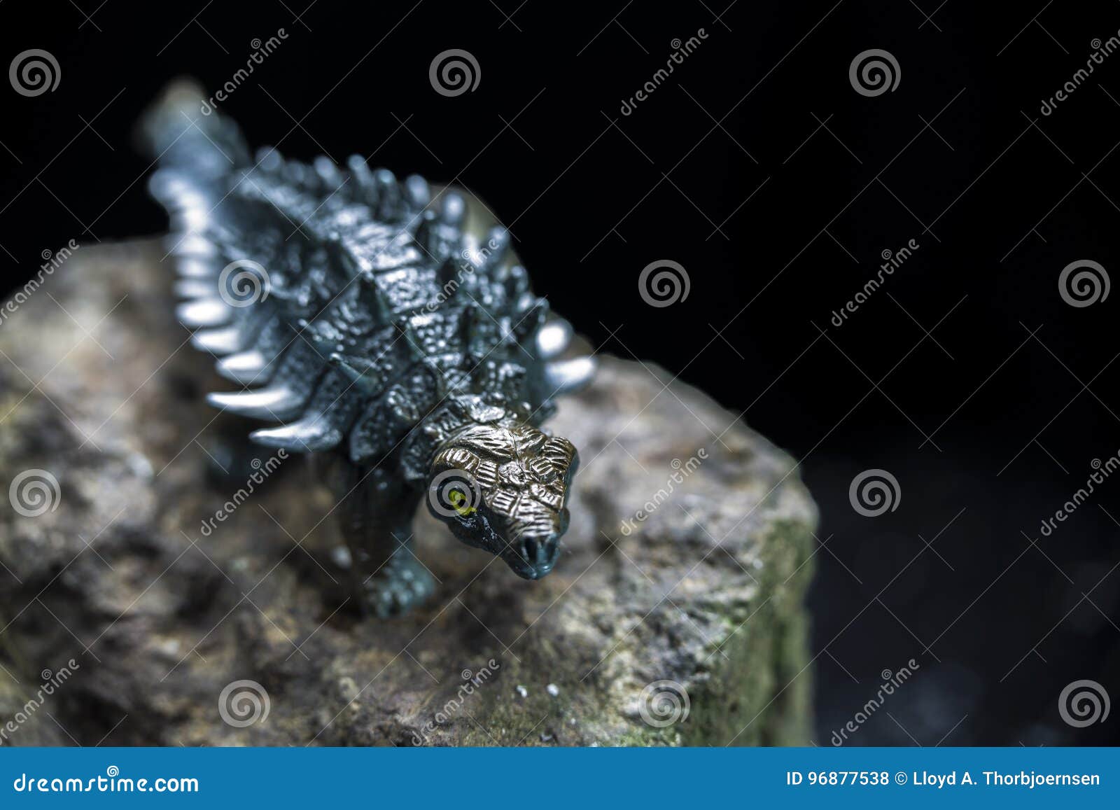 A Close-up Of An Ankylosaurus That Is Made Of Rubber And Metal ...