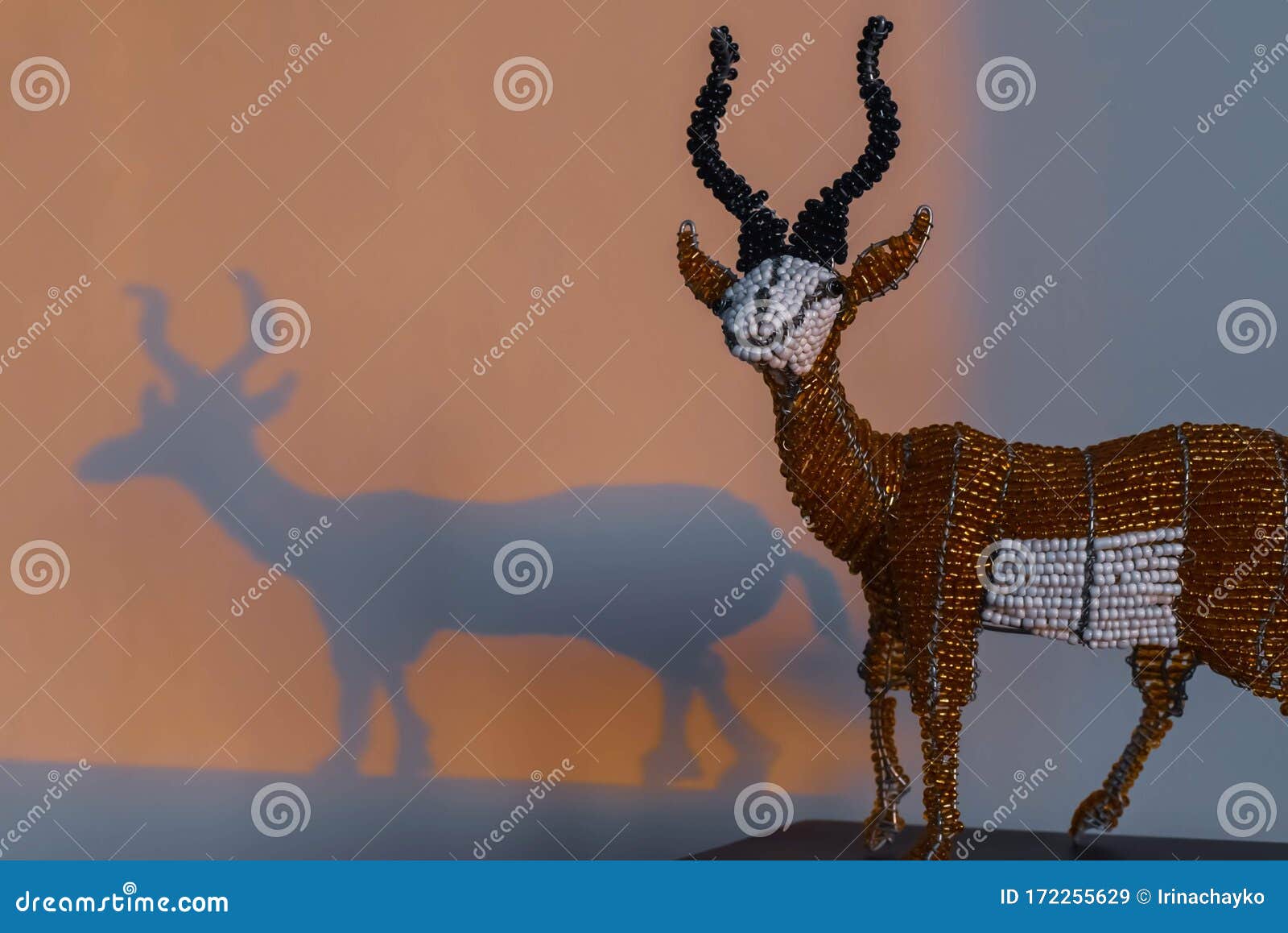 Toy Antelope and Its Shadow on the Wall Stock Image - Image of figure ...