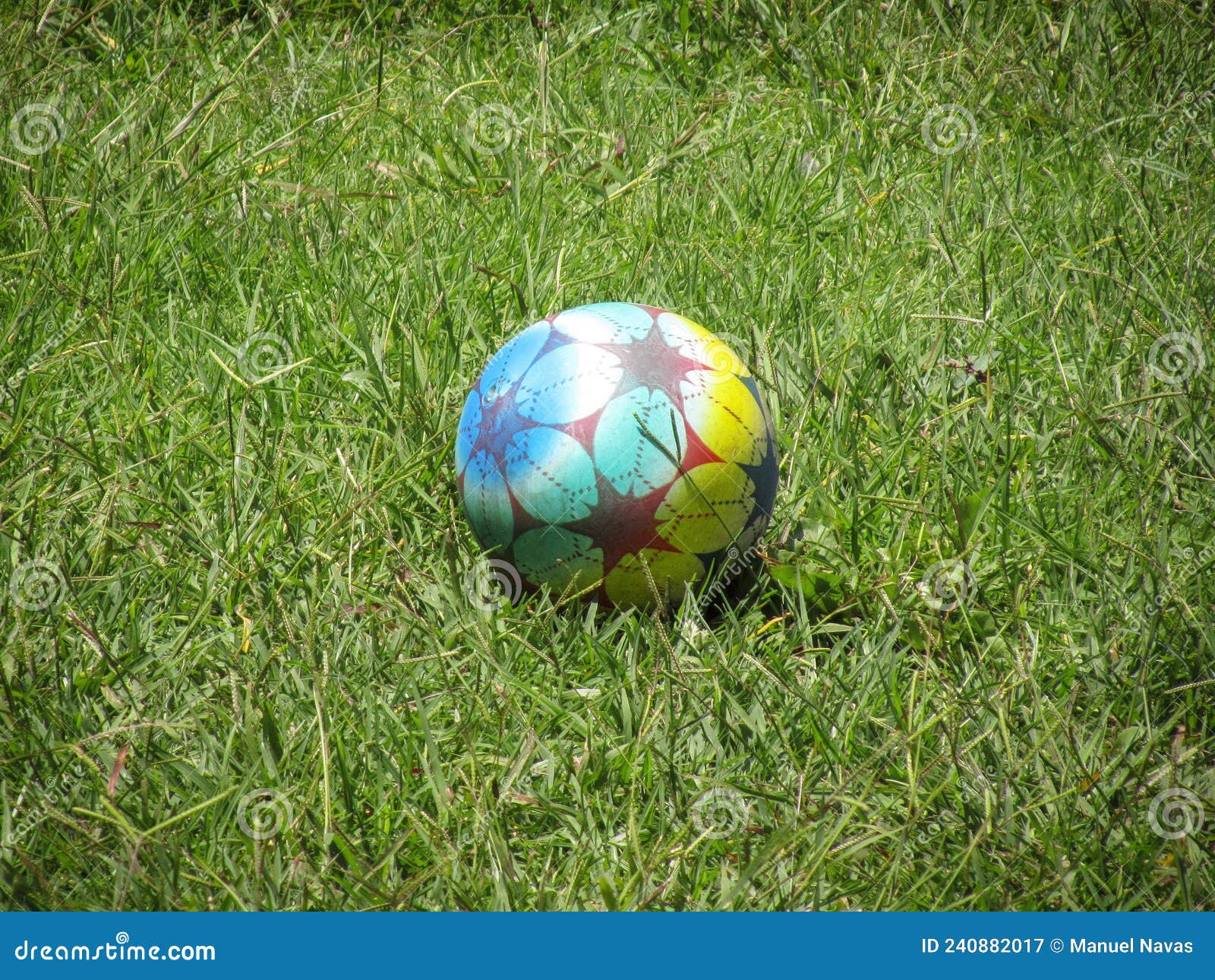 Toy Ball in a Lawn, Has a Star Pattern on it Stock Image - Image of ...