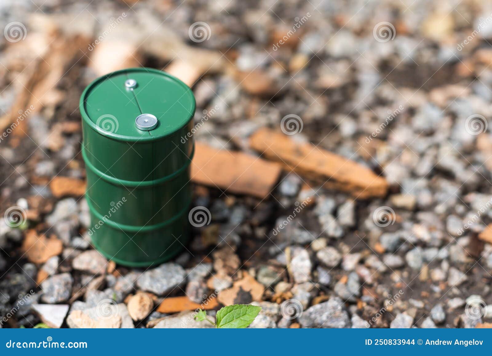 Toy barrel on the ground stock photo. Image of drum - 250833944