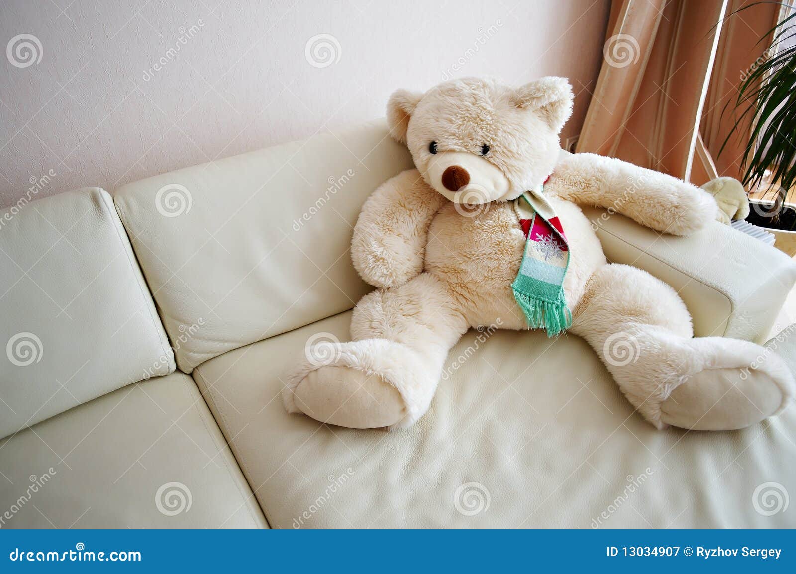Toy bear on couch stock image. Image of leather, comfort - 13034907