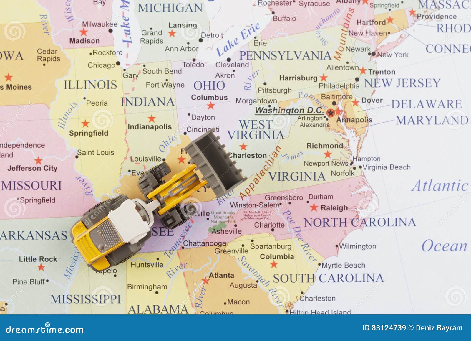Toy Bulldozer Over the American Map Stock Image - Image of construction ...