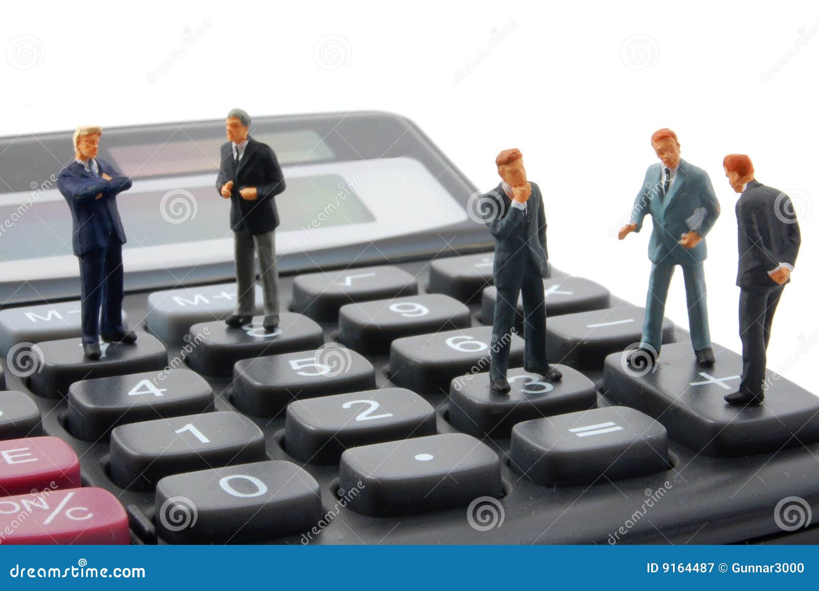 Toy Business Man on Calculator Isolated Stock Image - Image of economy ...
