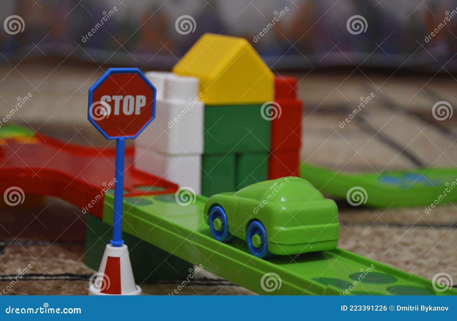 Toy Car in Front of a Stop Sign Stock Photo - Image of sports, racing ...