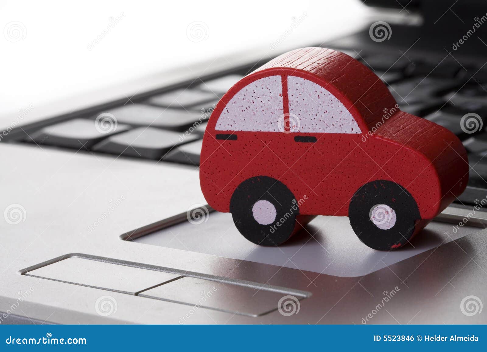 Toy car on a laptop stock photo. Image of vehicle, assistance - 5523846
