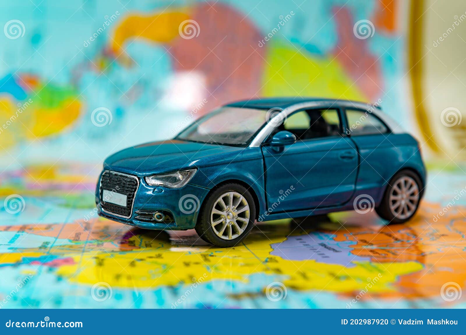 A Toy Car Stands on a Geographical Map Stock Photo - Image of family ...