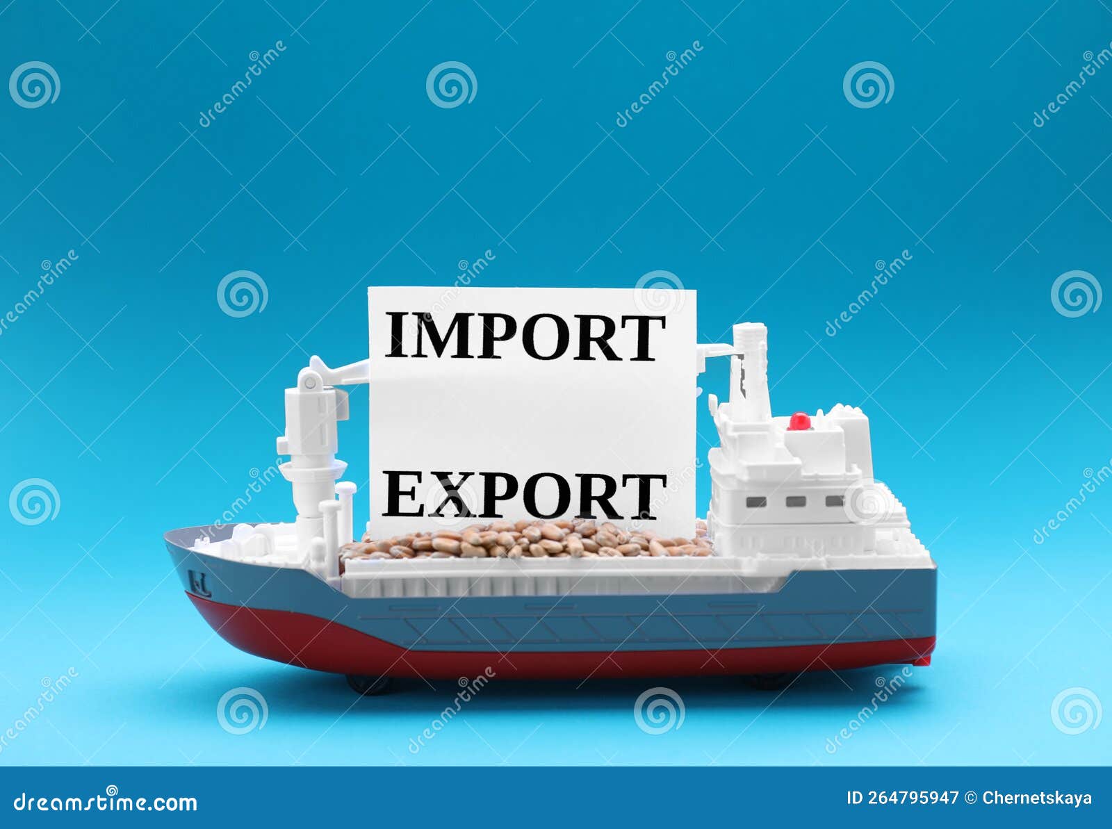Toy Cargo Vessel with Words Import and Export on Light Blue Background ...