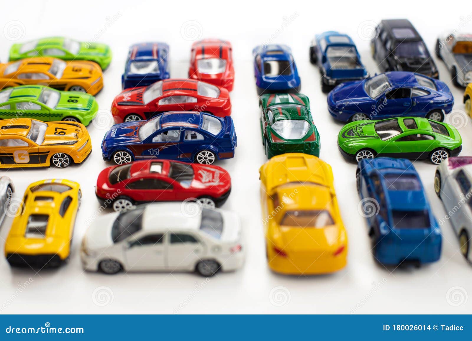 Toy Cars of Different Colors Arranged on a White Background Stock Photo ...