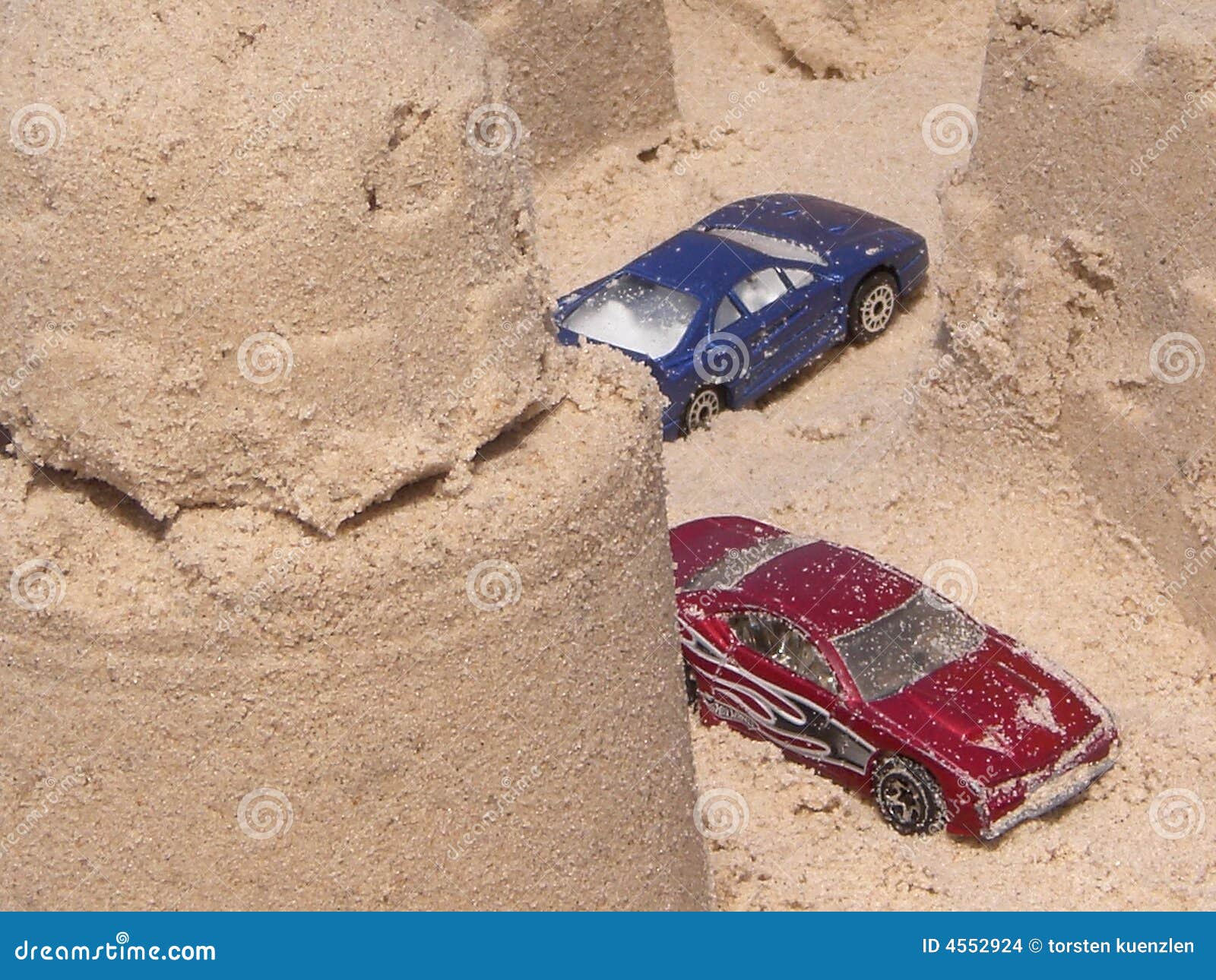 Toy cars in sand castle stock photo. Image of mini, automobile - 4552924
