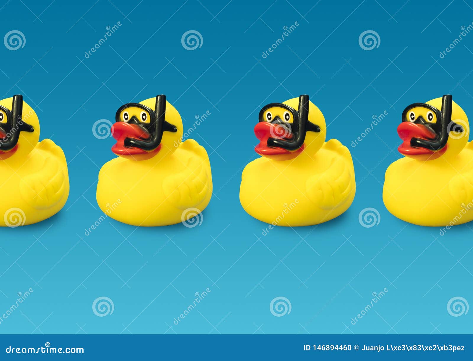 Toy Ducks Wearing Diving Goggles And Snorkel In Blue Background ...