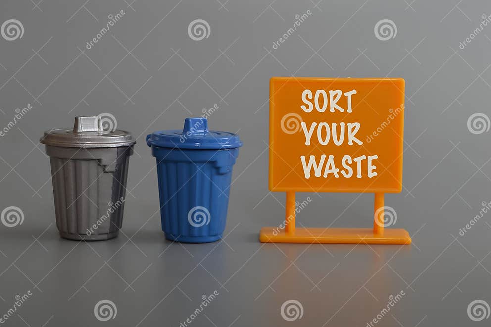 Toy Dustbin and Plastic Board Written with SORT YOUR WASTE Stock Image ...