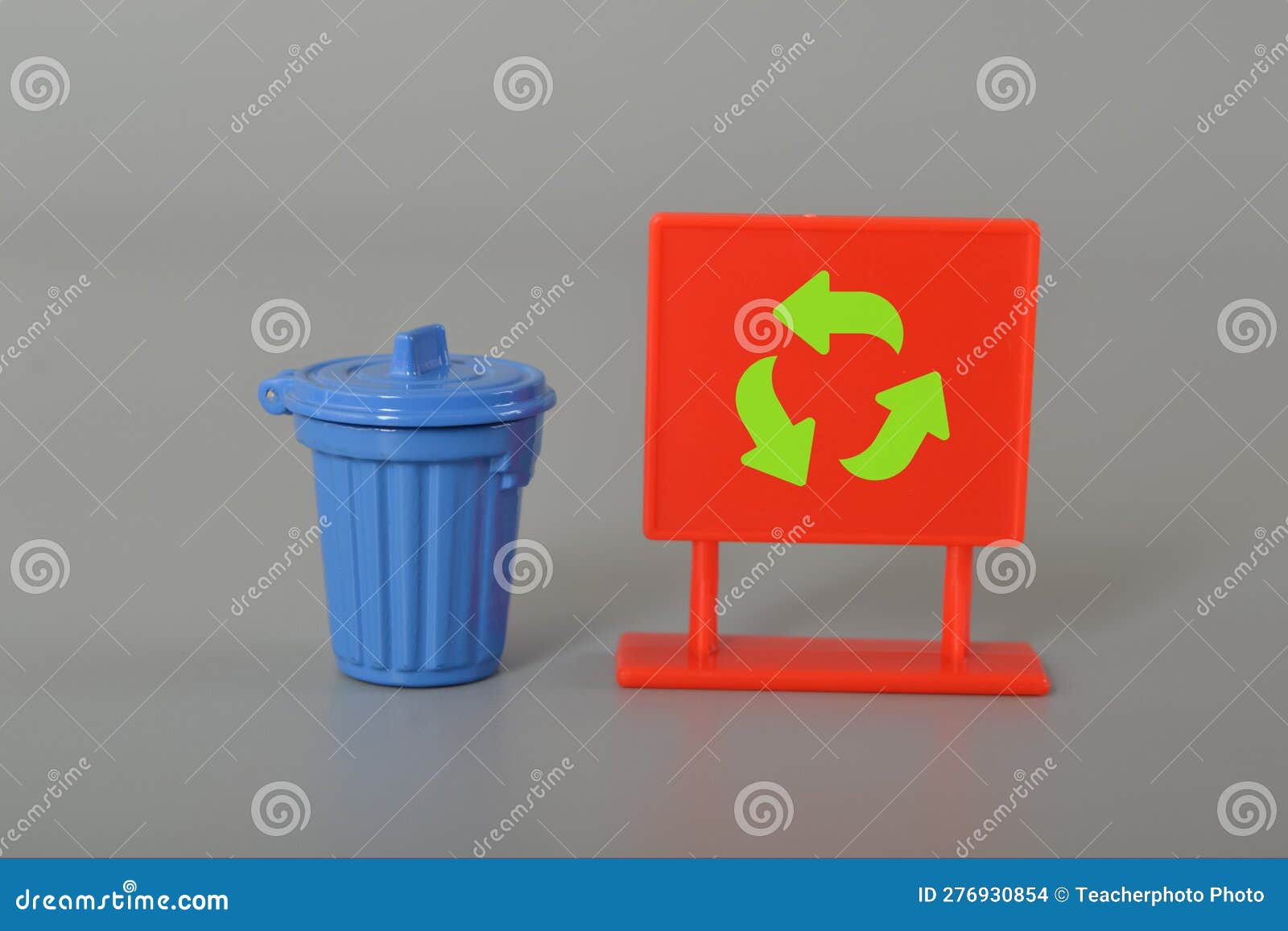 Toy Dustbin and Recycle Symbol. Loaded into a Recycling Bin Stock Photo ...