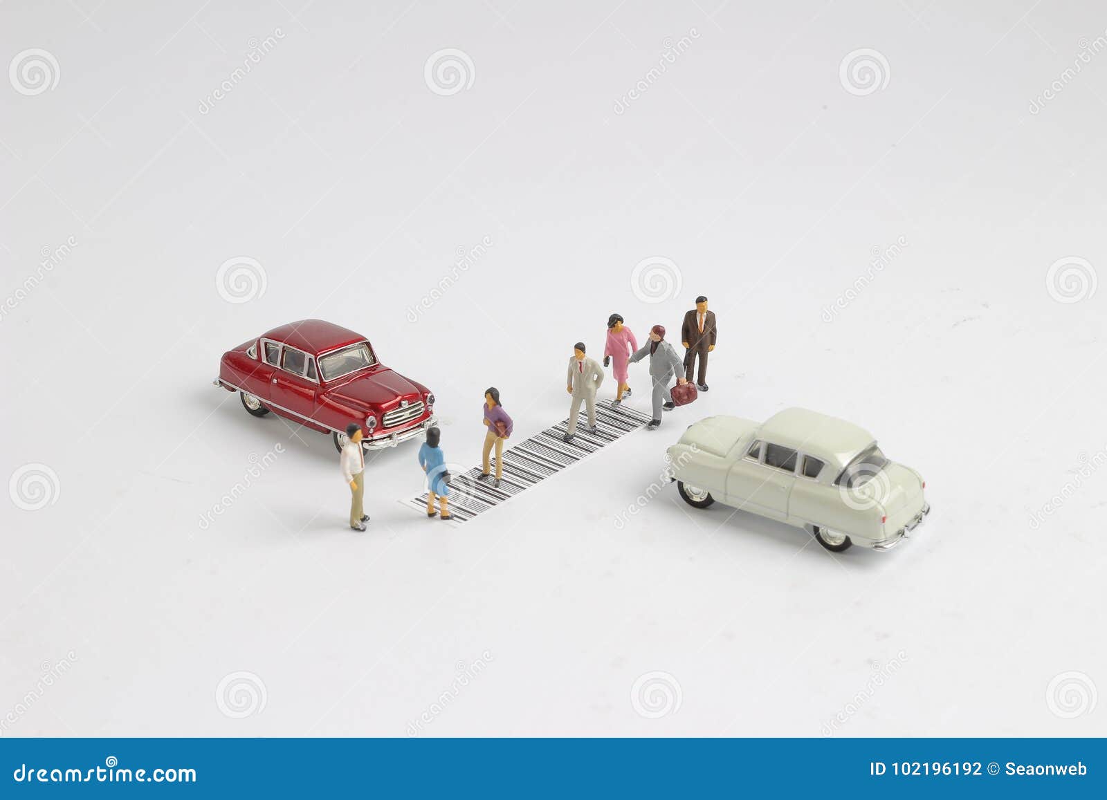 The Toy Figure Cross the Bar Code Stock Photo - Image of crowd ...