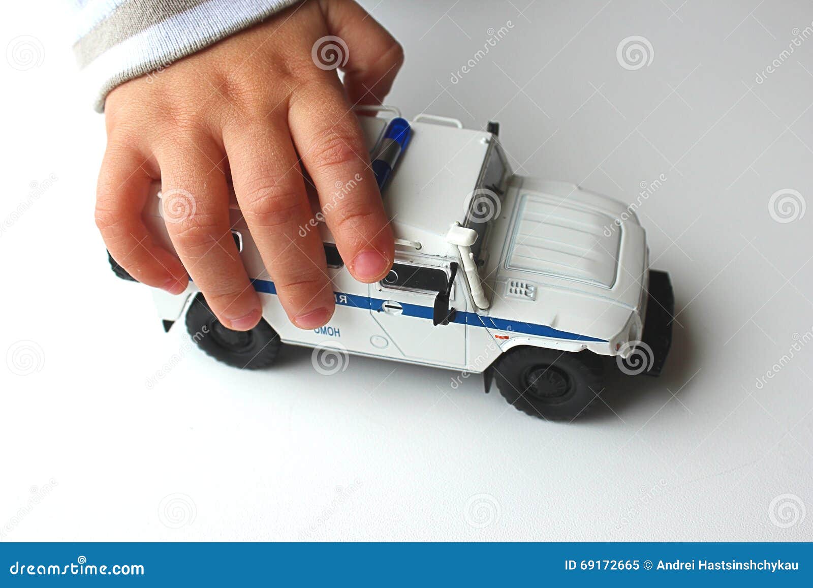 Toy in hand stock image. Image of fingers, machine, pushes - 69172665