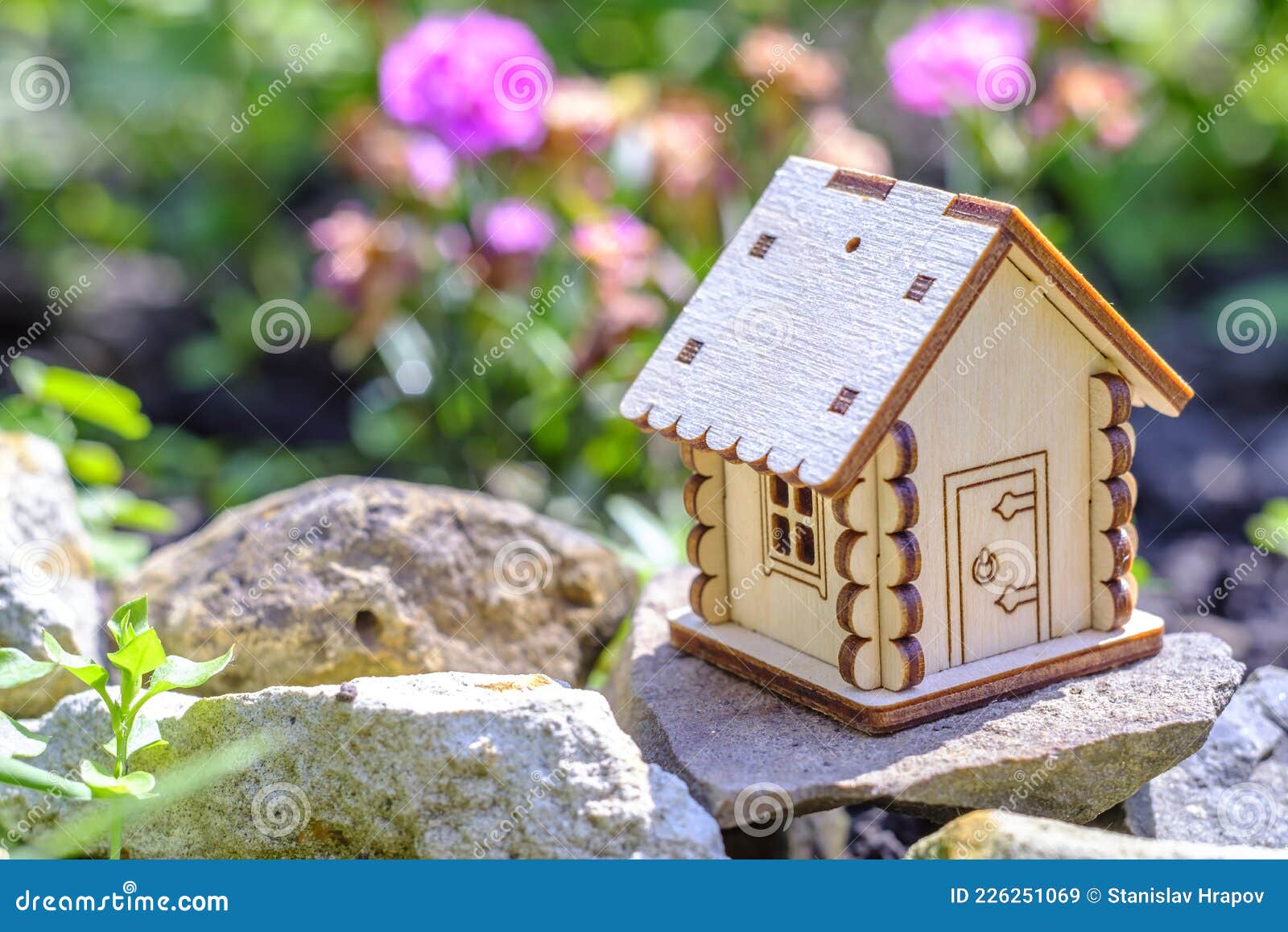 Toy House on Stone with Greenery Background Stock Image - Image of ...