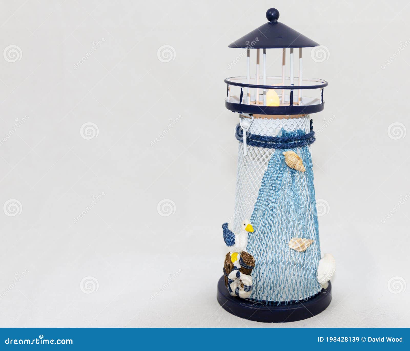 Toy Lighthouse with Copy Space on Left Side and a White Background ...